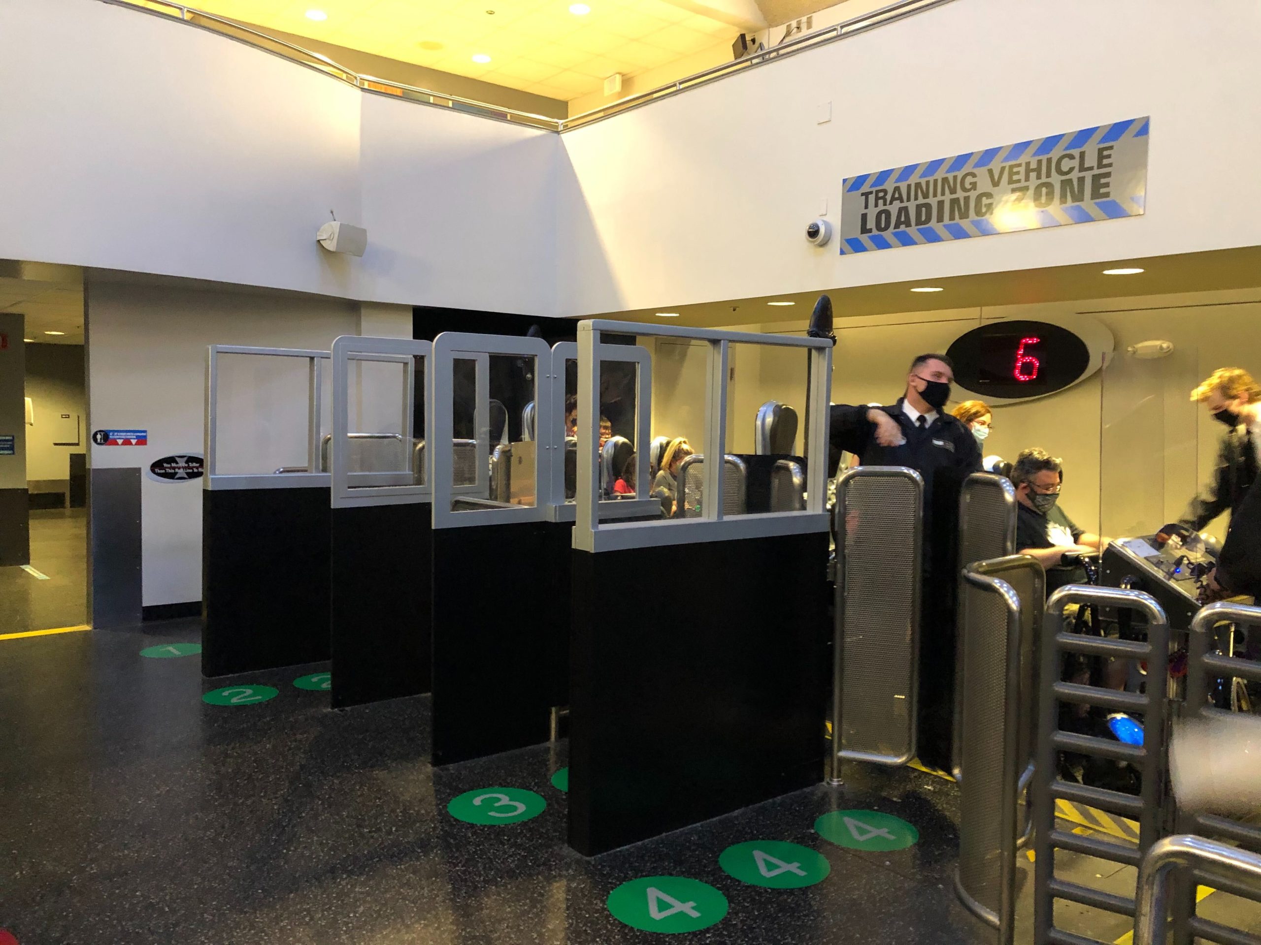 men in black alien attack plexiglass dividers 1 - WDW News Today