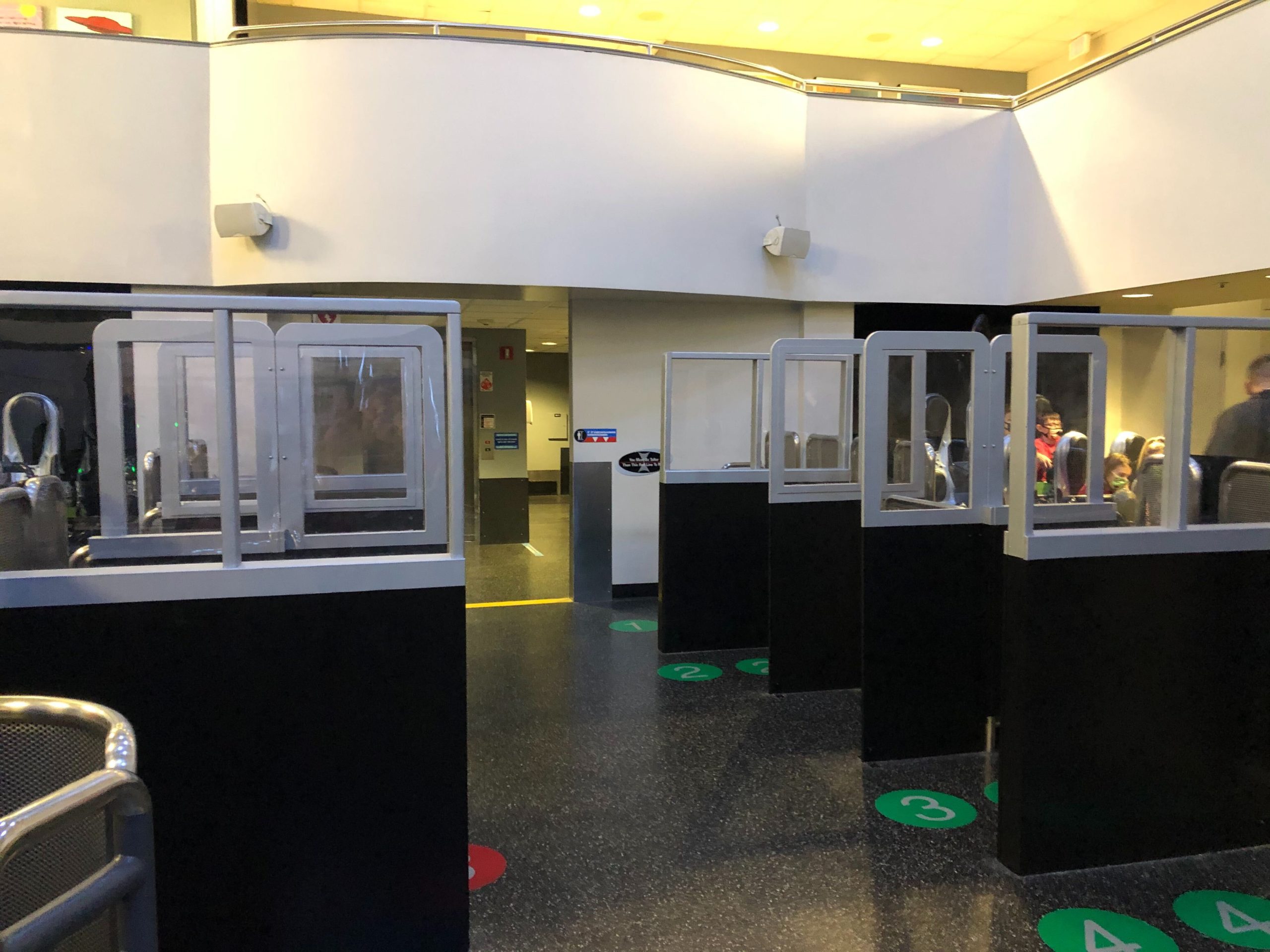 men in black alien attack plexiglass dividers 3 - WDW News Today