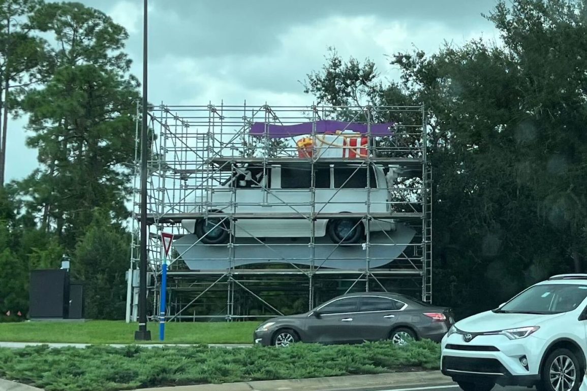 Painting Begins on Goofy Driving A Van Disney Vacation Club Billboard ...