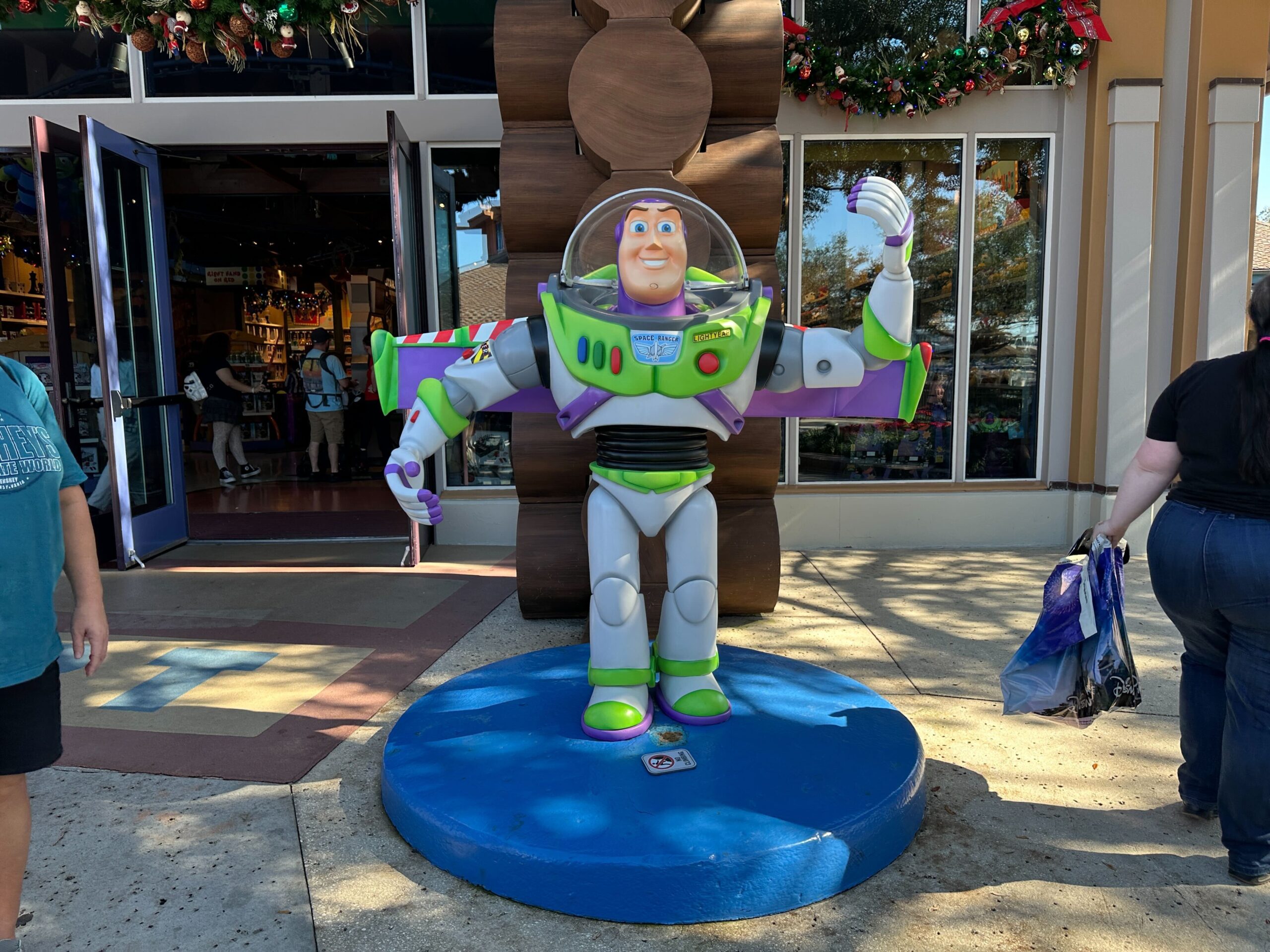 Buzz Lightyear Statue Returns to Once Upon a Toy in Disney Springs ...