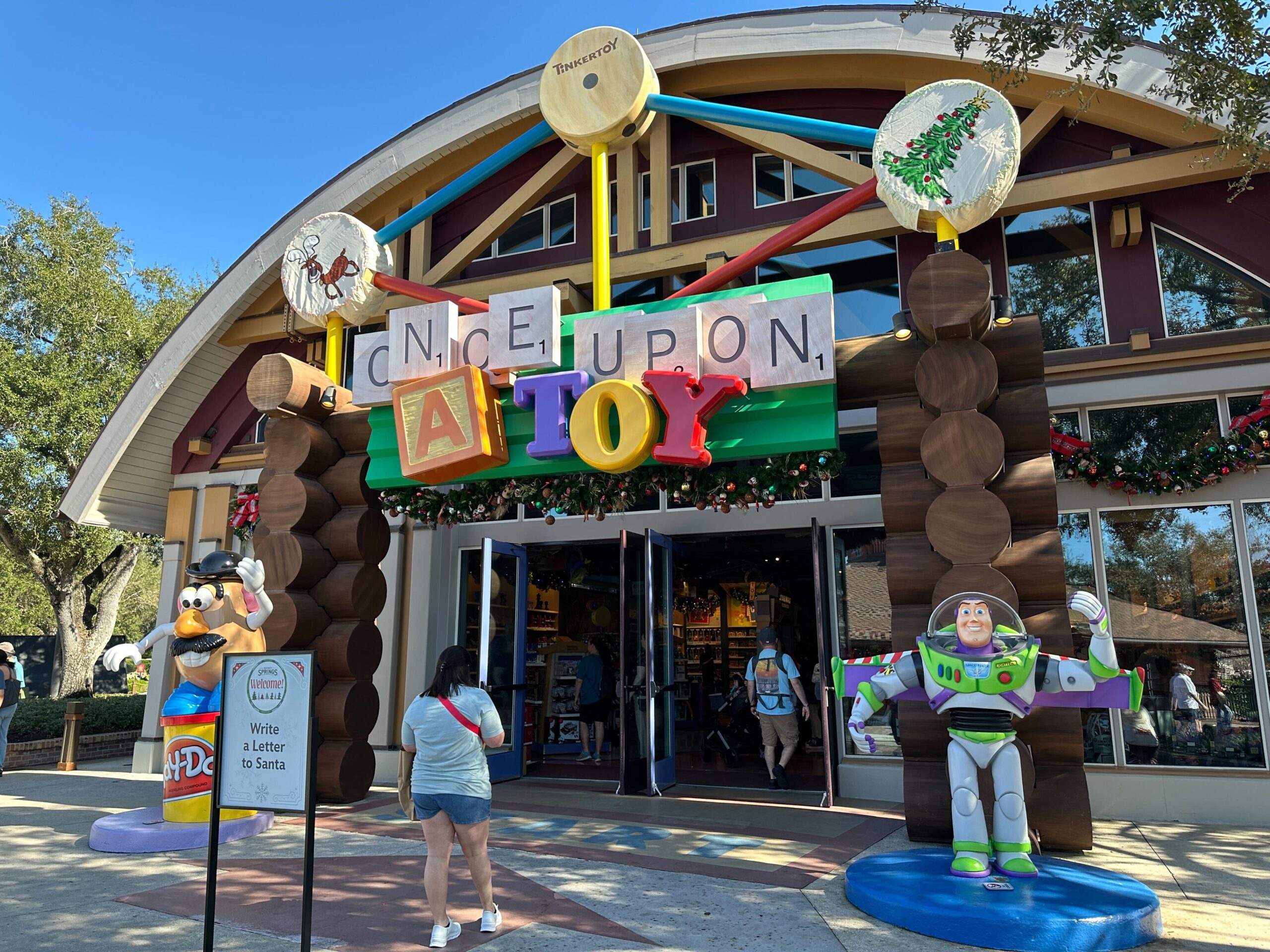 Buzz Lightyear Statue Returns to Once Upon a Toy in Disney Springs ...