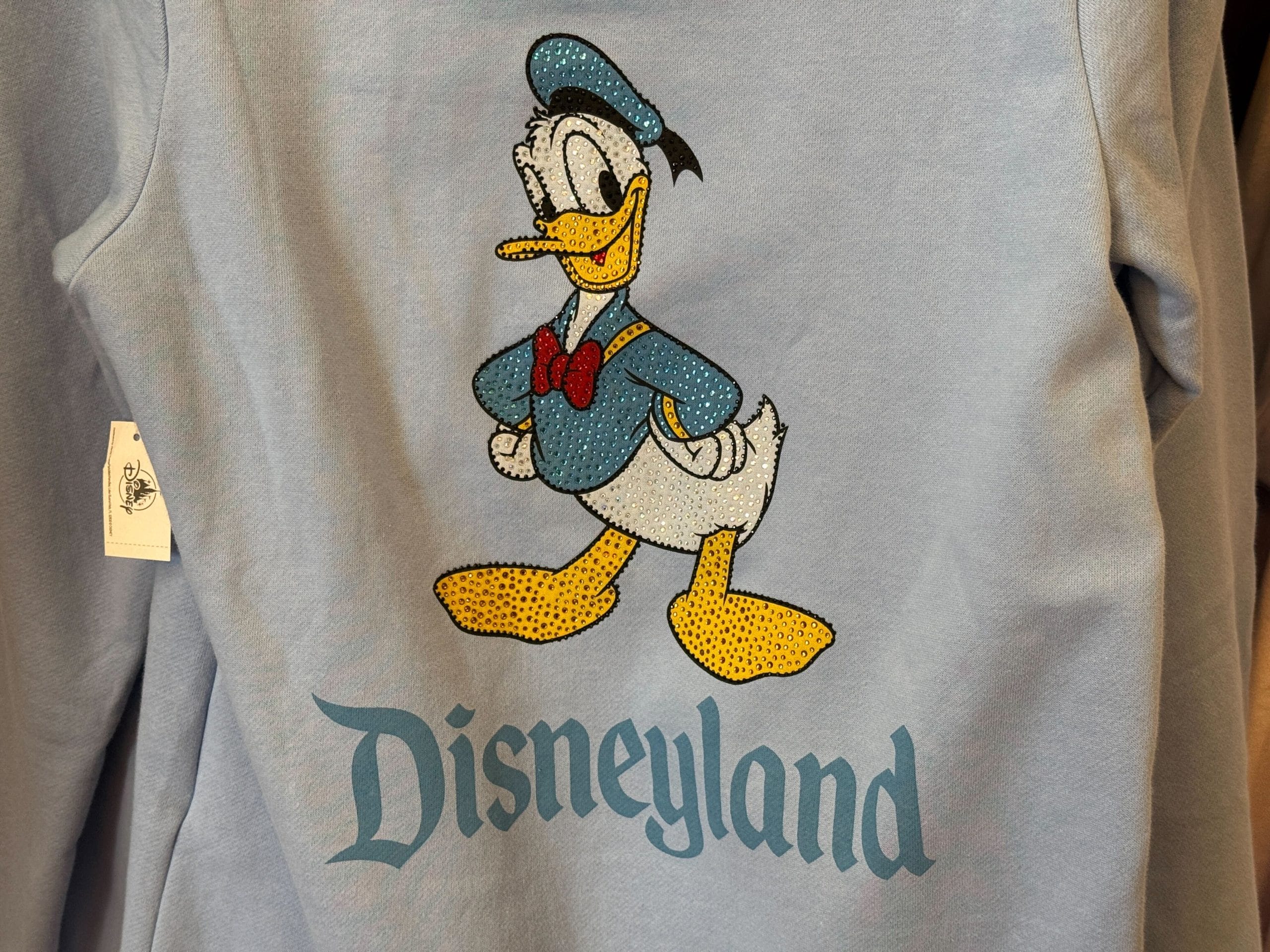 Bedazzled Donald and Daisy Hoodies Now Available in Disneyland - WDW ...